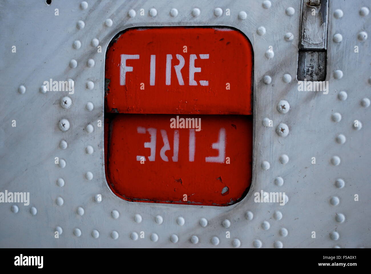 Fire button on airplane Stock Photo - Alamy