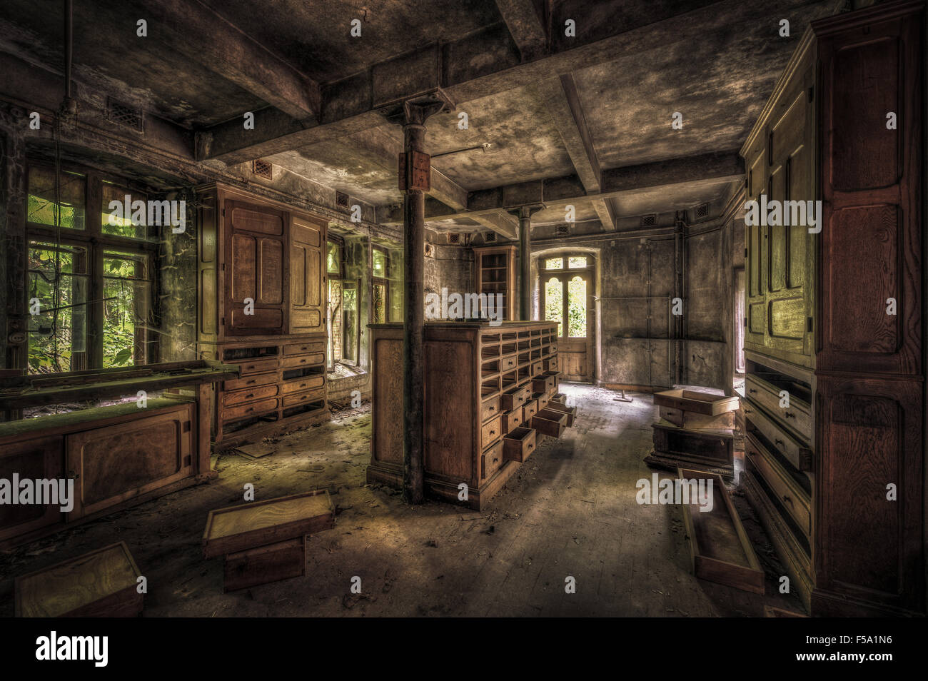 Cupboards in a dilapidated room Stock Photo - Alamy