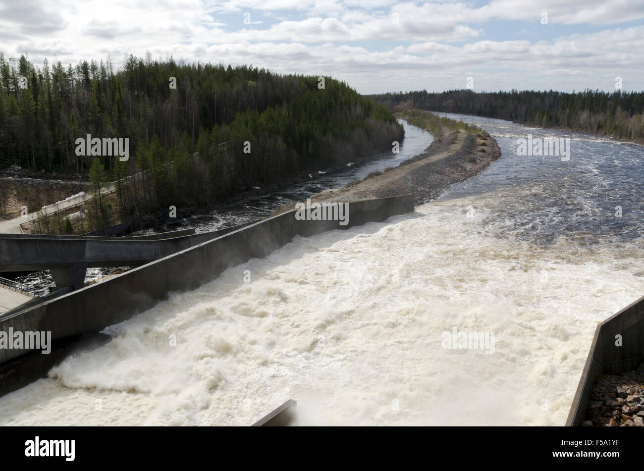 Open floodgates in a dam in the North of Sweden Stock Photo - Alamy