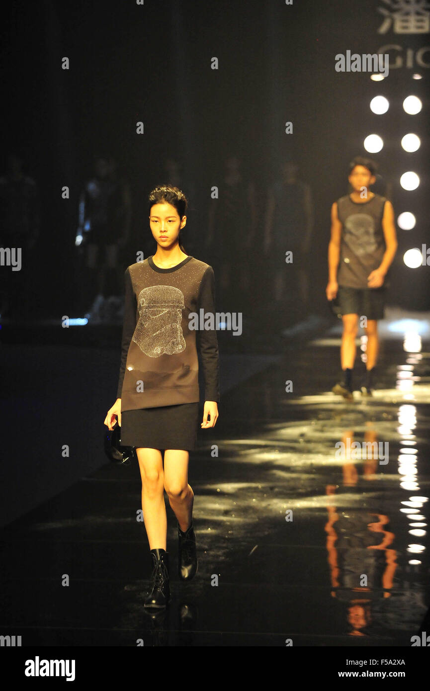 Beijing, China. 31st Oct, 2015. Models present creations designed by ...