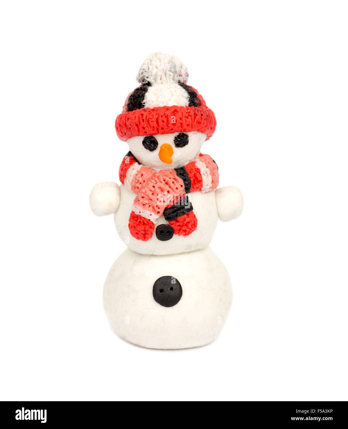 Hand made plasticine or modeling clay figure of snowman on white ...