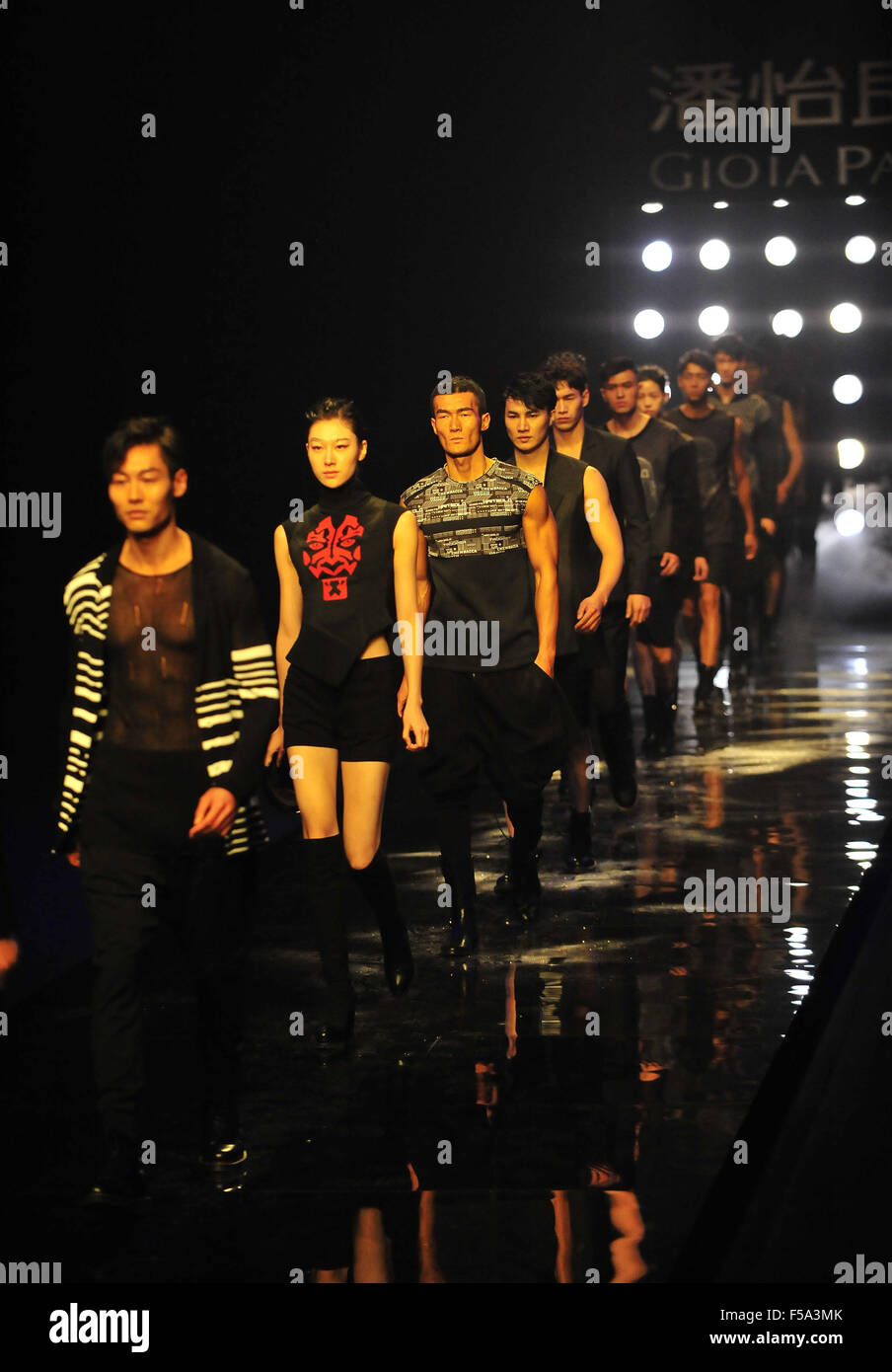 Beijing, China. 31st Oct, 2015. Models present creations designed by ...