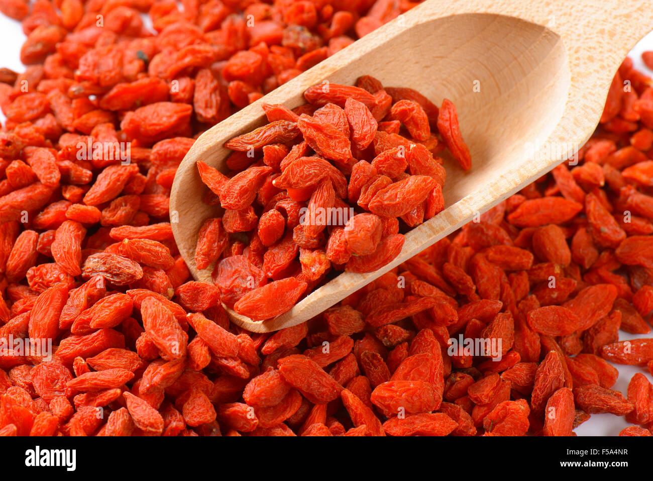 Dried wolf berries with wooden scoop Stock Photo - Alamy