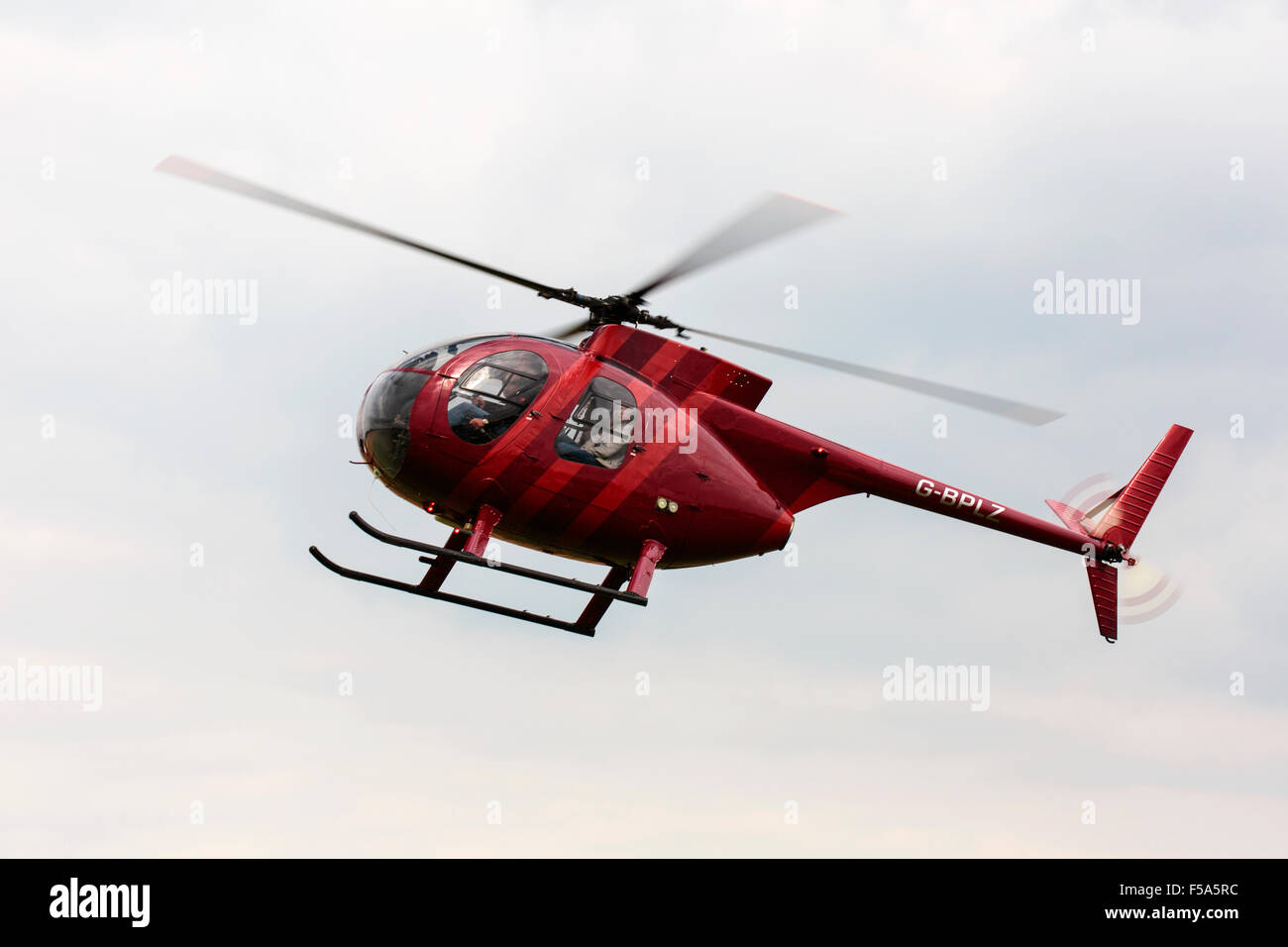 Hughes 369HS G BPLZ in flight at Breighton Airfield Stock Photo - Alamy