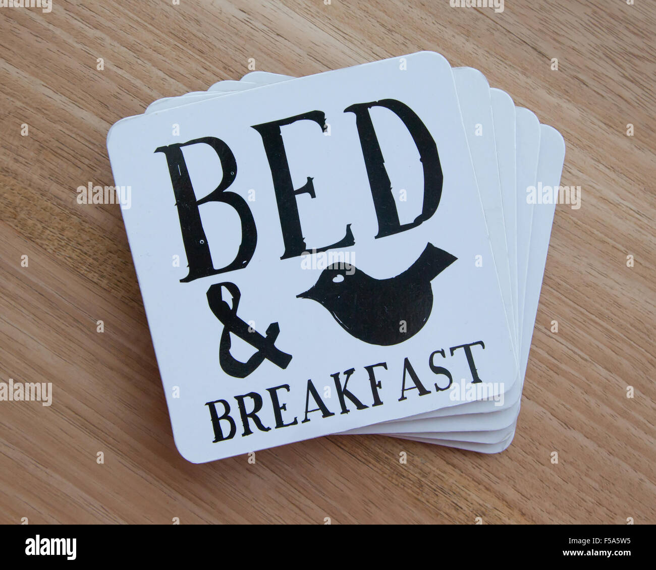 Set of coasters in a bed and breakfast Stock Photo - Alamy