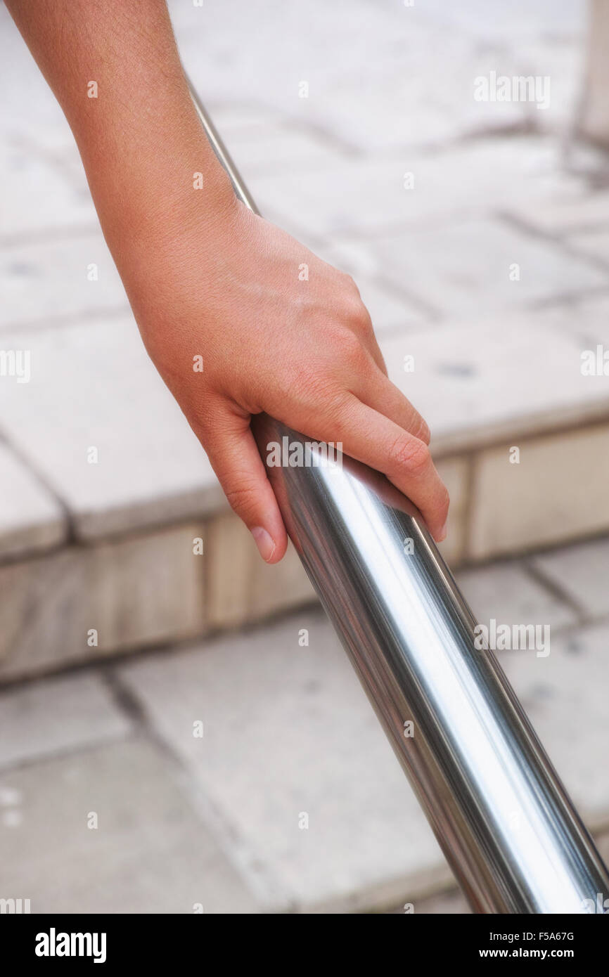 Hand holding railing hi-res stock photography and images - Alamy