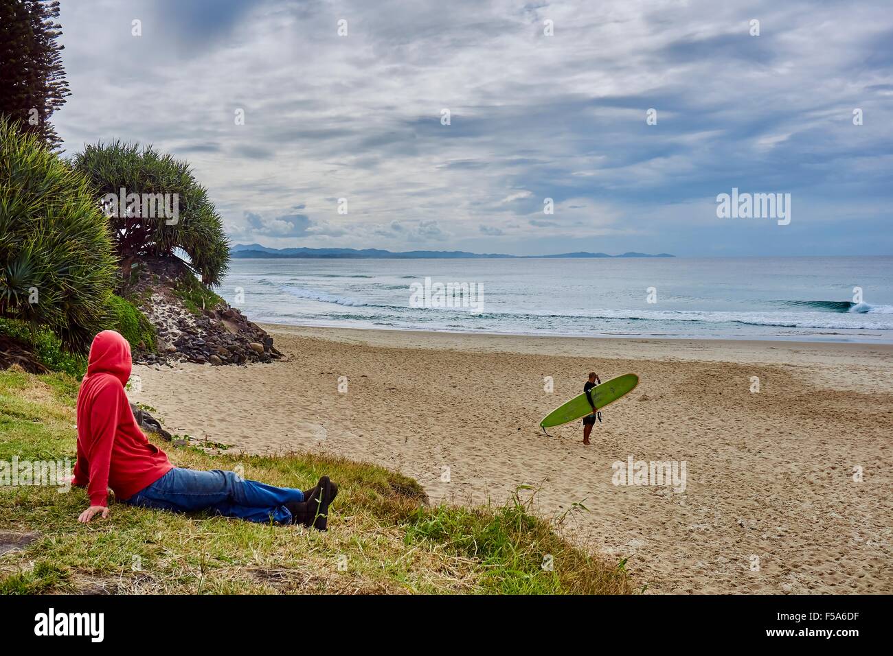 Byron Bay Beach Surfer and Observer Stock Photo - Alamy