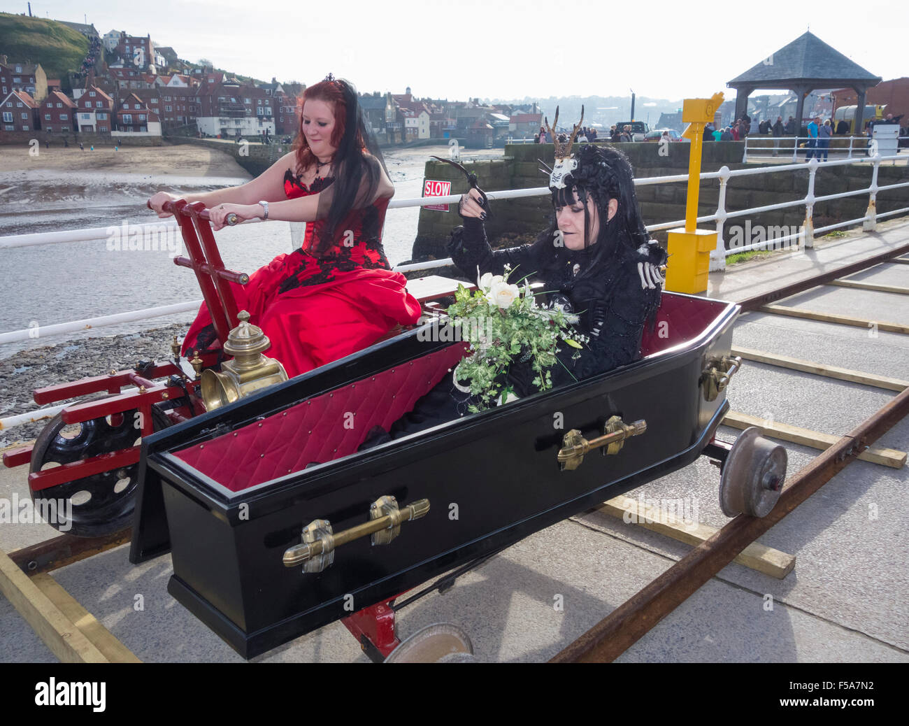 Coffin ride on pier at Whitby Goth festival. Whitby, North Yorkshire ...
