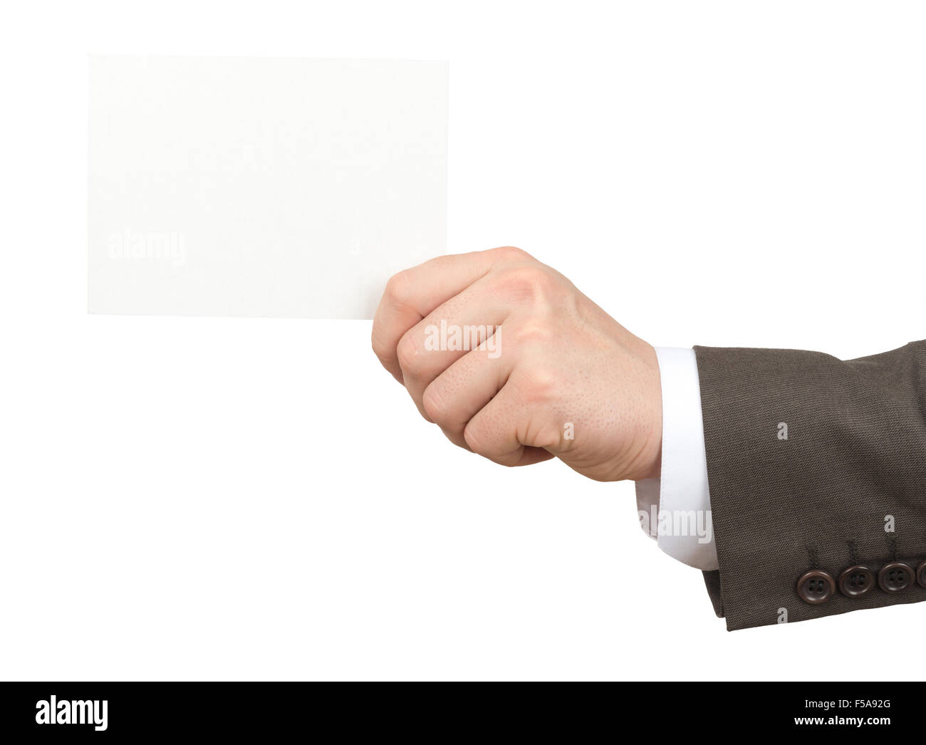 Businessman holding small blank paper Stock Photo - Alamy