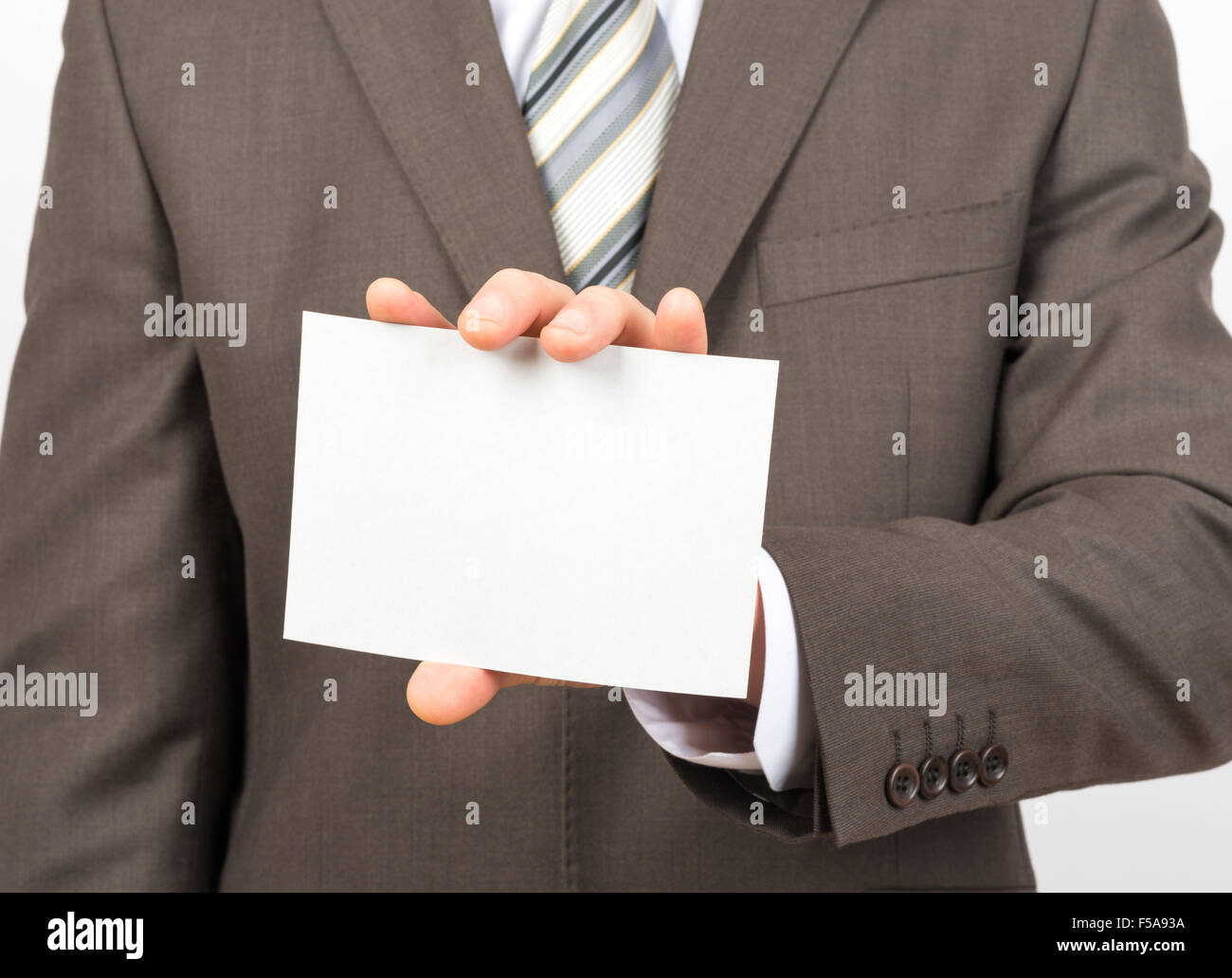Businessman holding blank sheet hi-res stock photography and images - Alamy
