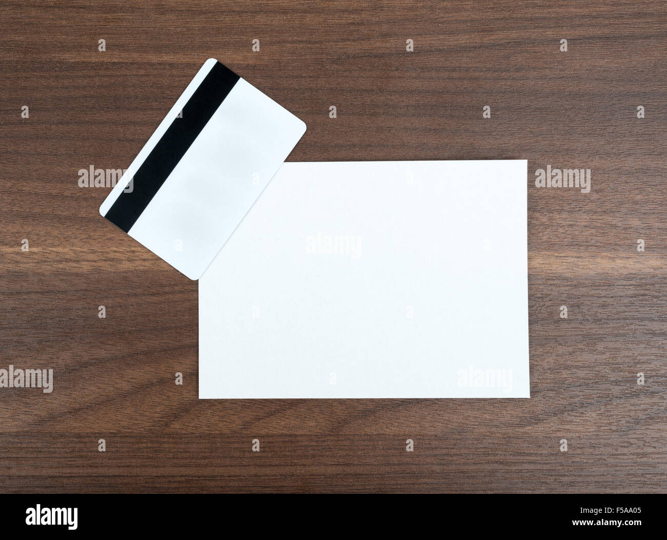 Blank paper with credit card Stock Photo - Alamy
