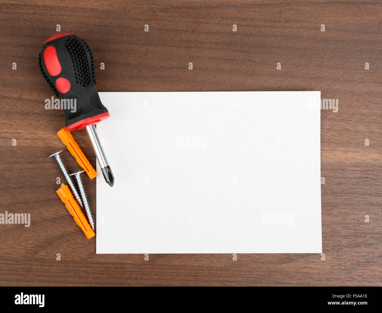 Blank card with screwdriver Stock Photo - Alamy