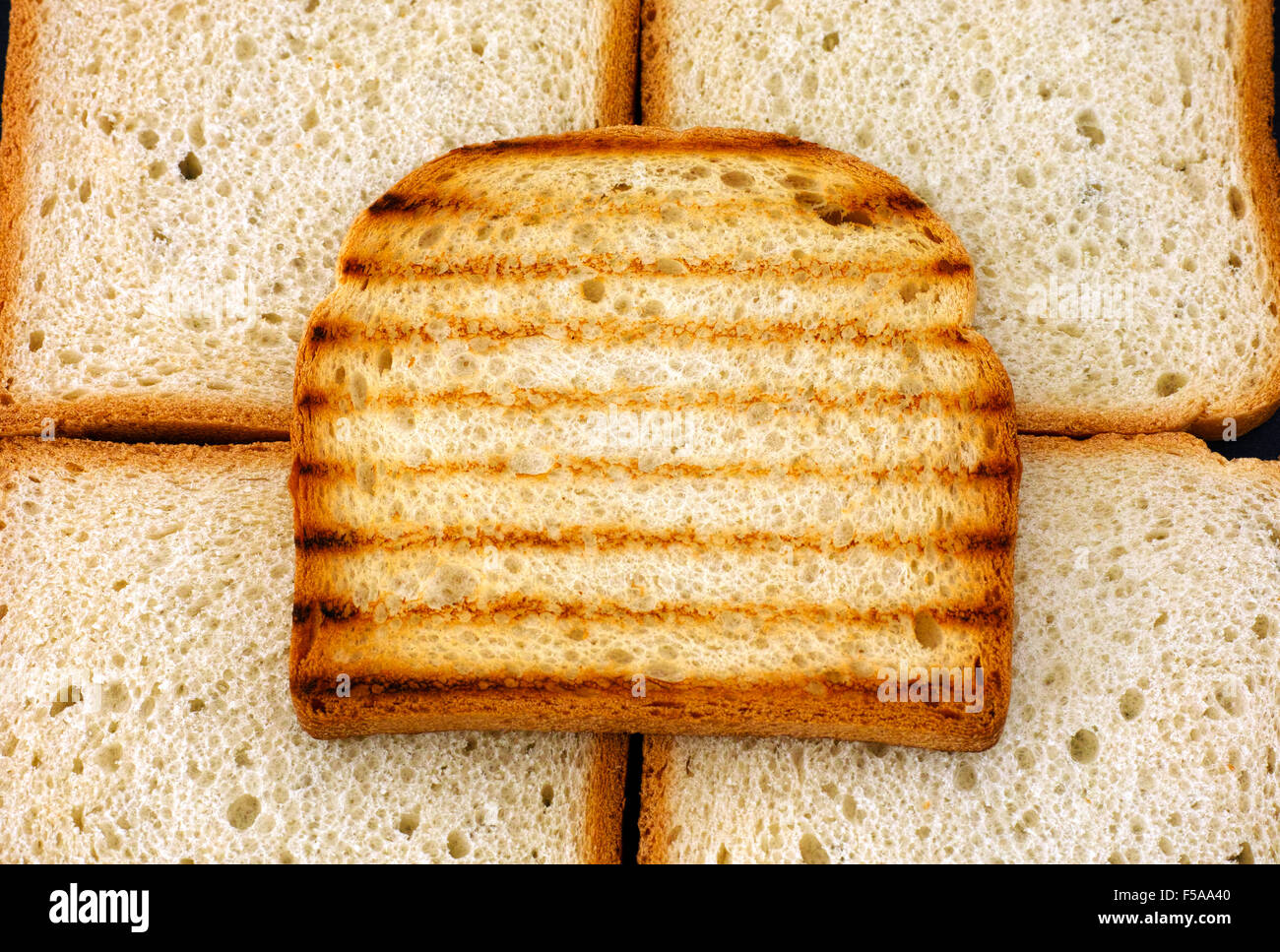 Toasted bread slice on white bread slices Stock Photo - Alamy