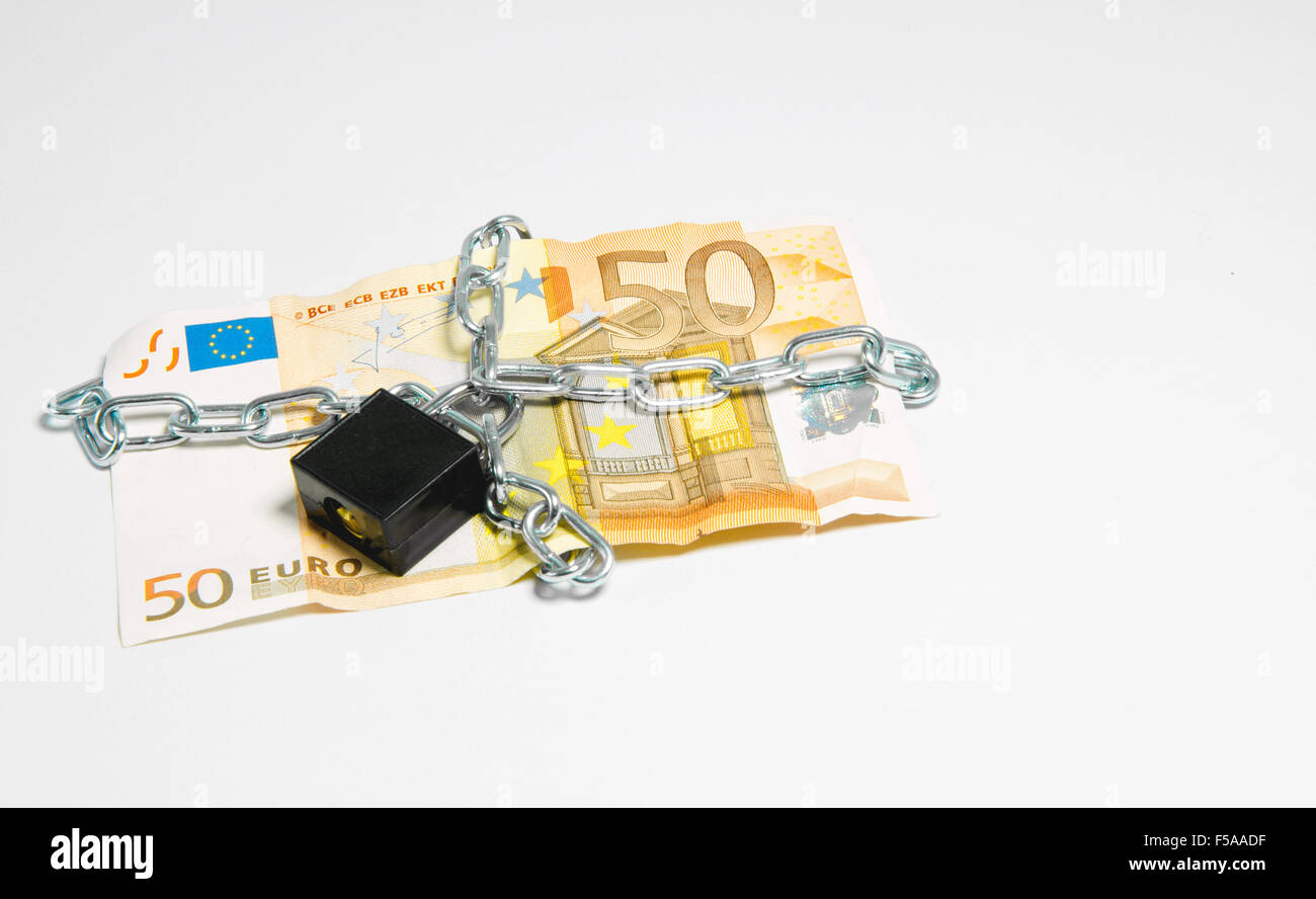 Fifty Euro note with metal chain and padlock. Concept of money security ...