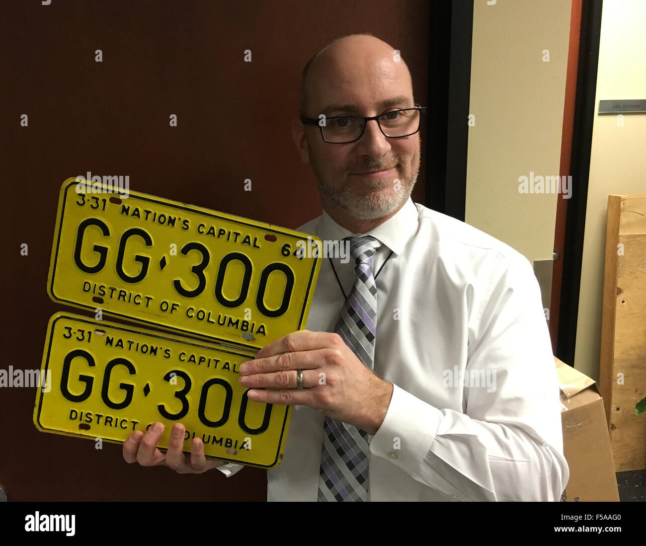 Dallas, USA. 28th Oct, 2015. Noah Fleisher from Heritage Auctions holds ...
