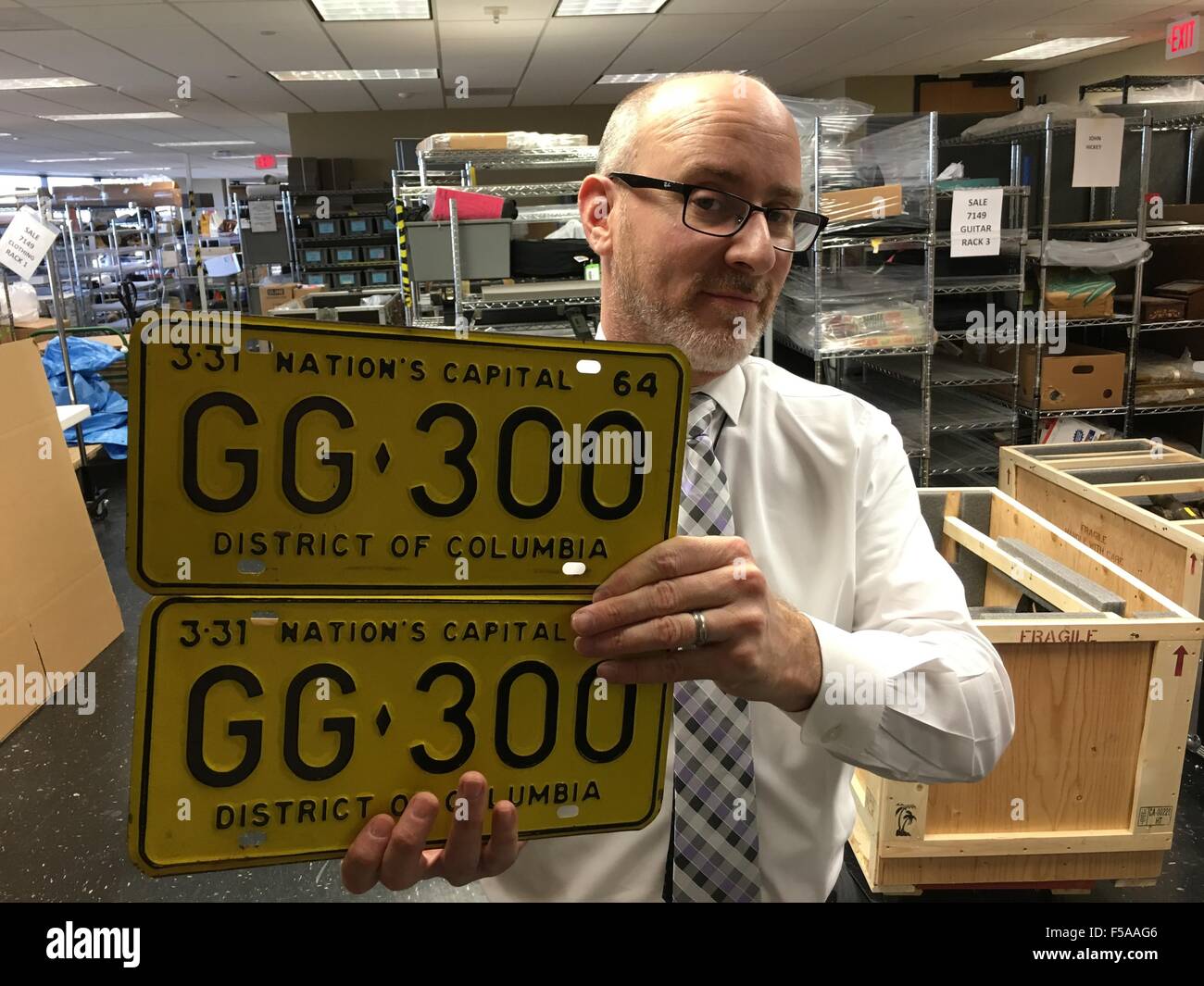 Dallas, USA. 28th Oct, 2015. Noah Fleisher from Heritage Auctions holds ...