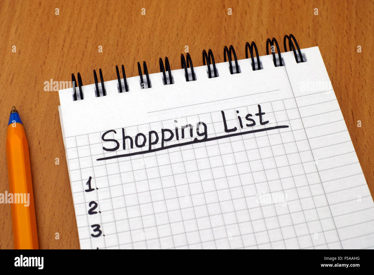 Words Shopping List written on white note pad with ballpoint pen Stock ...