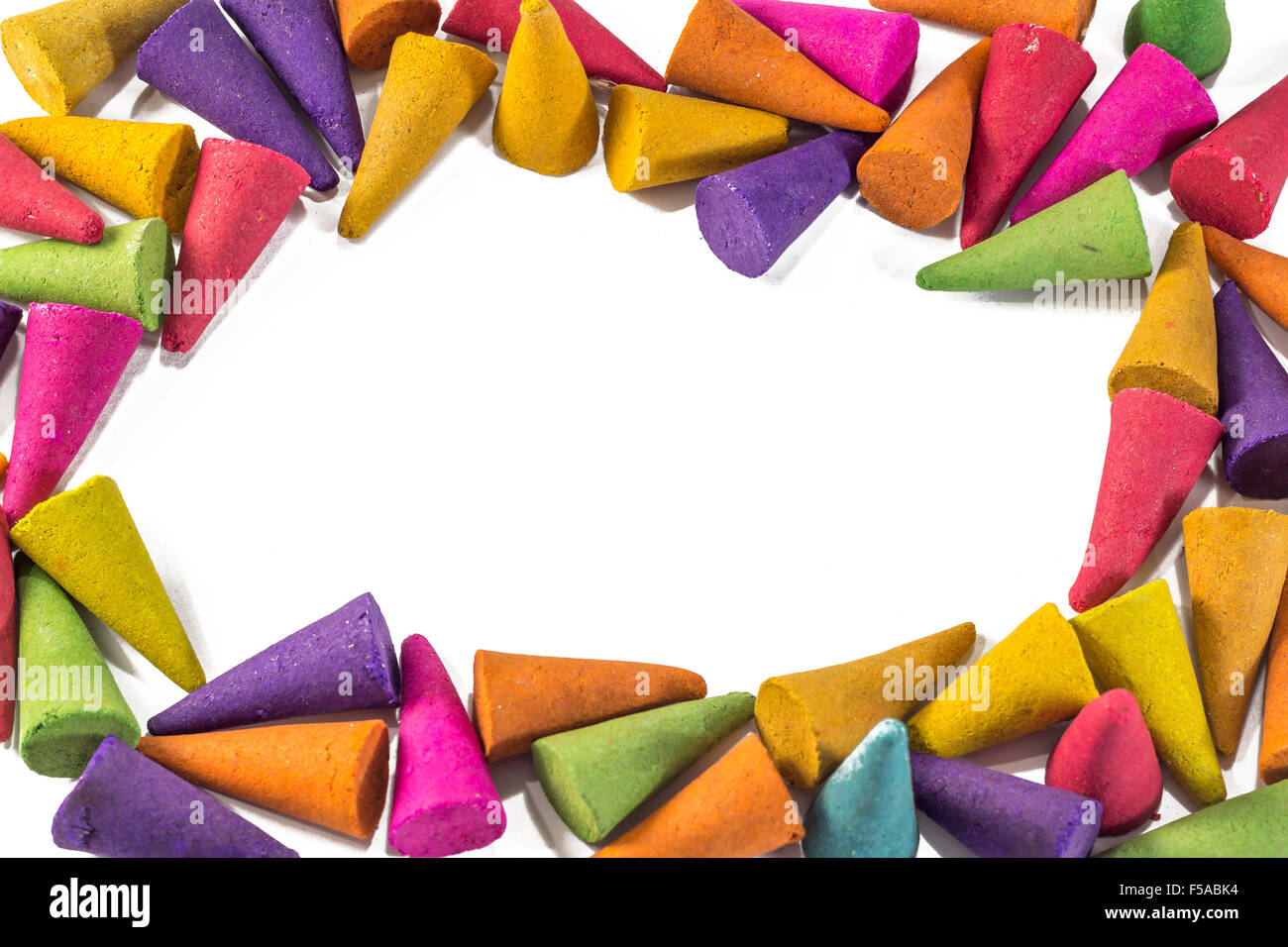 Colorful incense cones with white background Stock Photo - Alamy