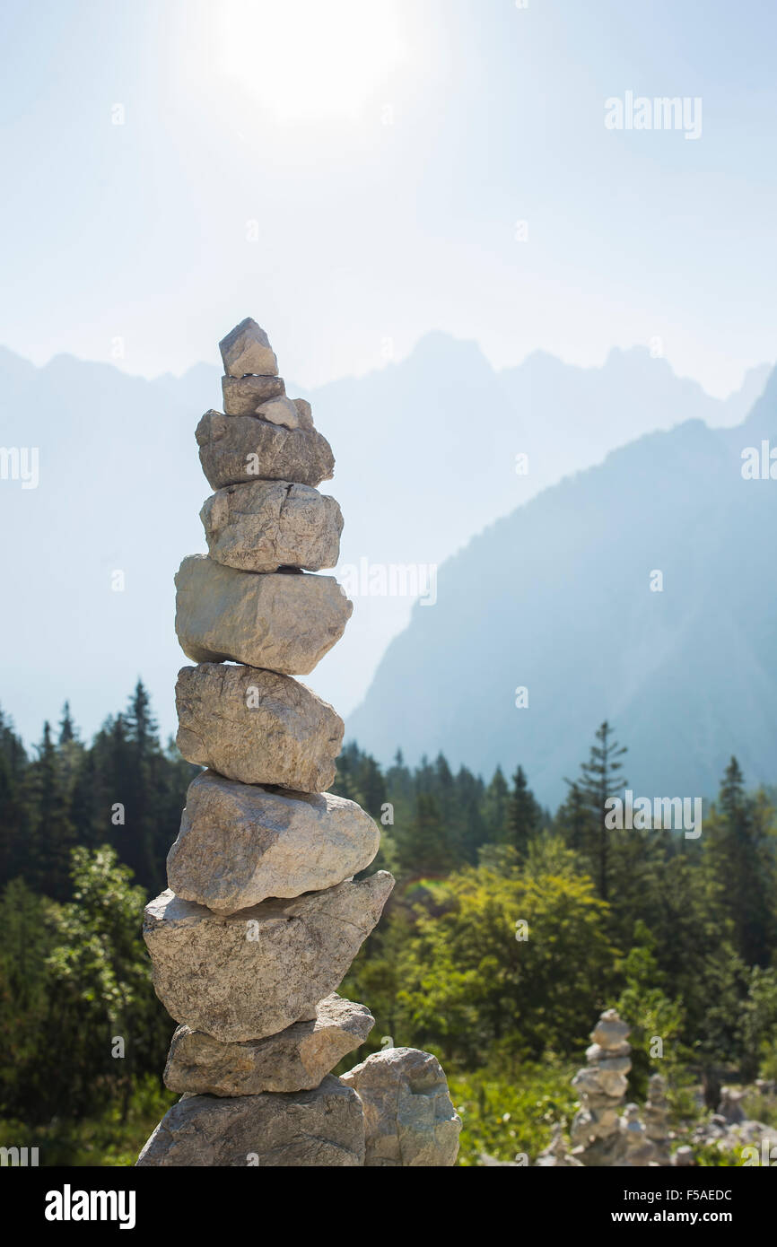 Stacked rock tower in nature, man made Stock Photo - Alamy