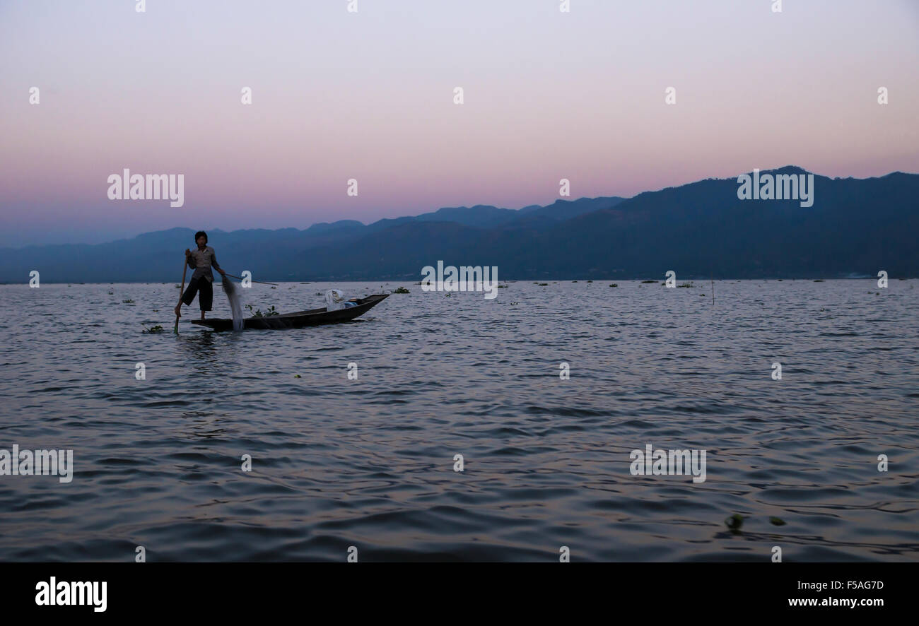 Inle lake fisher at sunset Stock Photo - Alamy