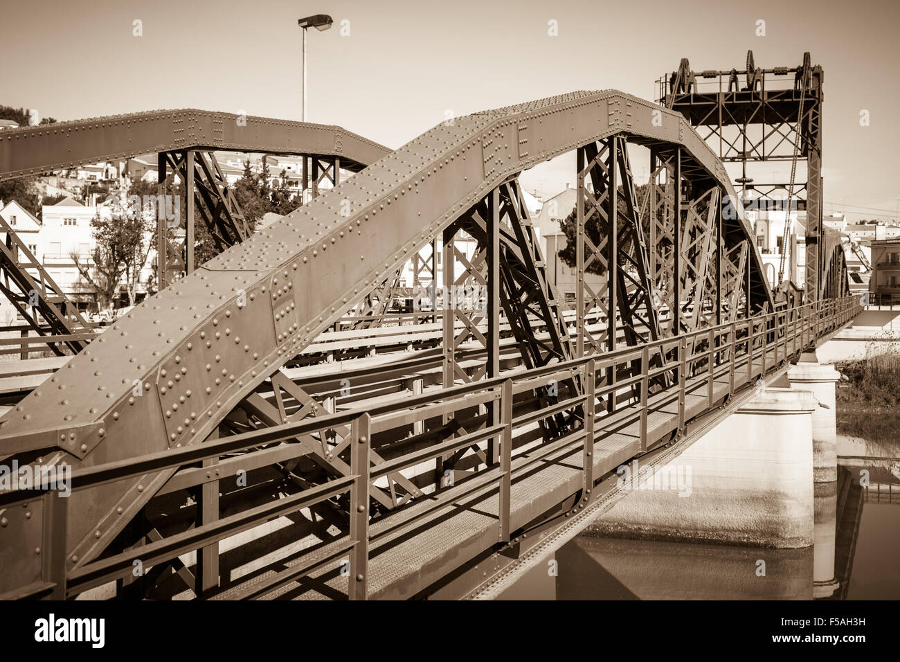 Metal structure elevation bridge over Sado river. Alcacer do Sal ...