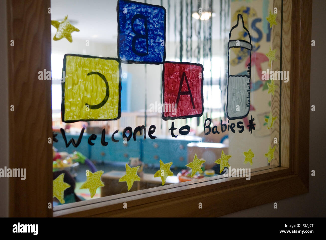 welcome to babies ABC sign at pre school nursery Stock Photo - Alamy