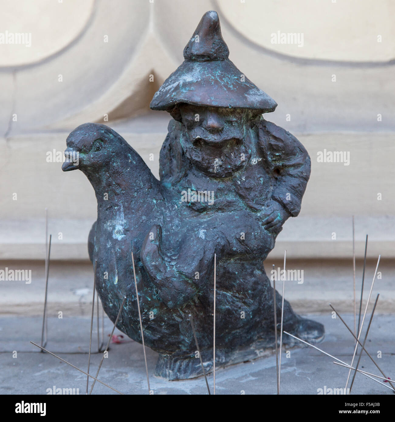 Pigeon-keeper dwarf in Wroclaw, Poland Stock Photo - Alamy