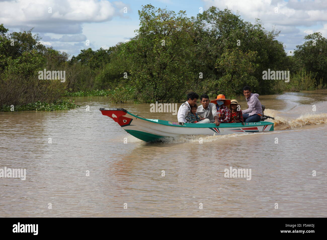 People in boat Stock Photo - Alamy