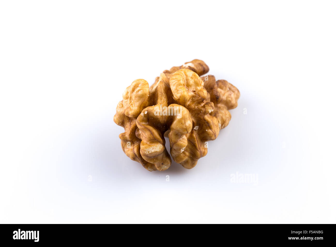 Dried walnut nut close up shot on white Stock Photo - Alamy