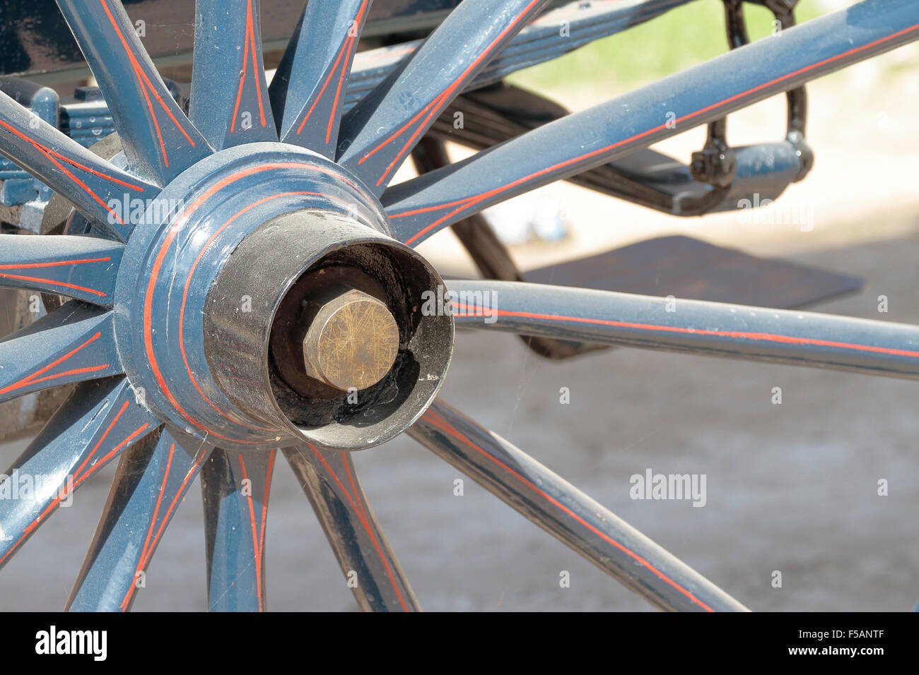 detail of an antique blue cart wheel Stock Photo - Alamy