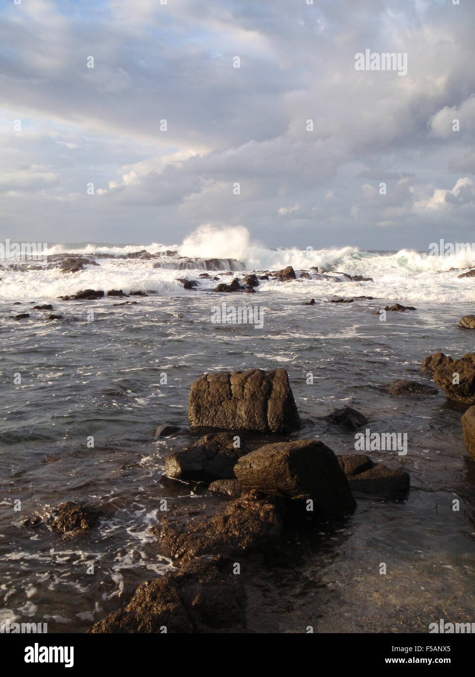 Rocks and stormy sea Stock Photo - Alamy
