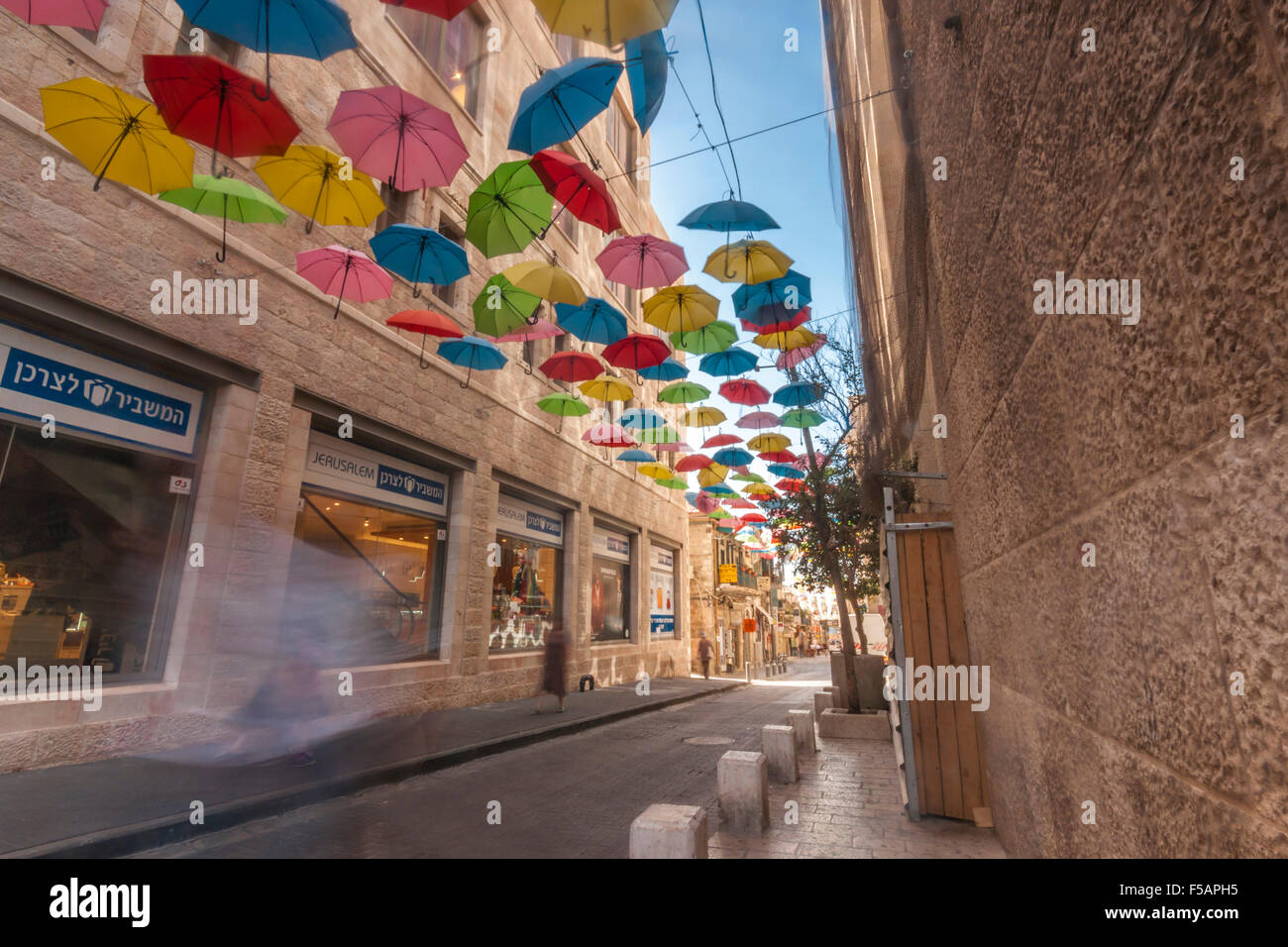 Israel. People walk in the Umbrellas-covered Yoel Moshe Solomon st. in ...