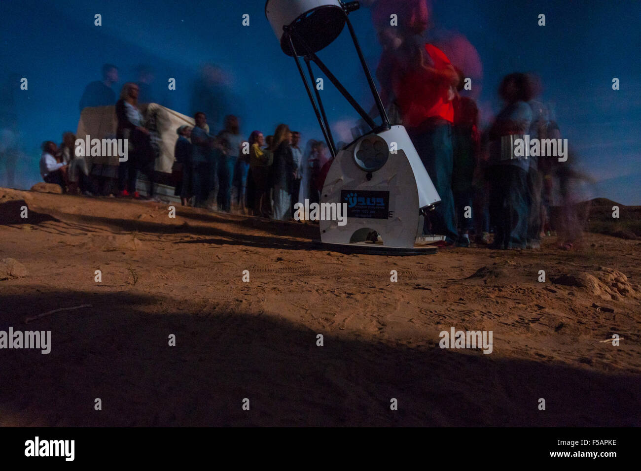 Ramon Crater, Israel. People line up to watch stars using a mirror ...