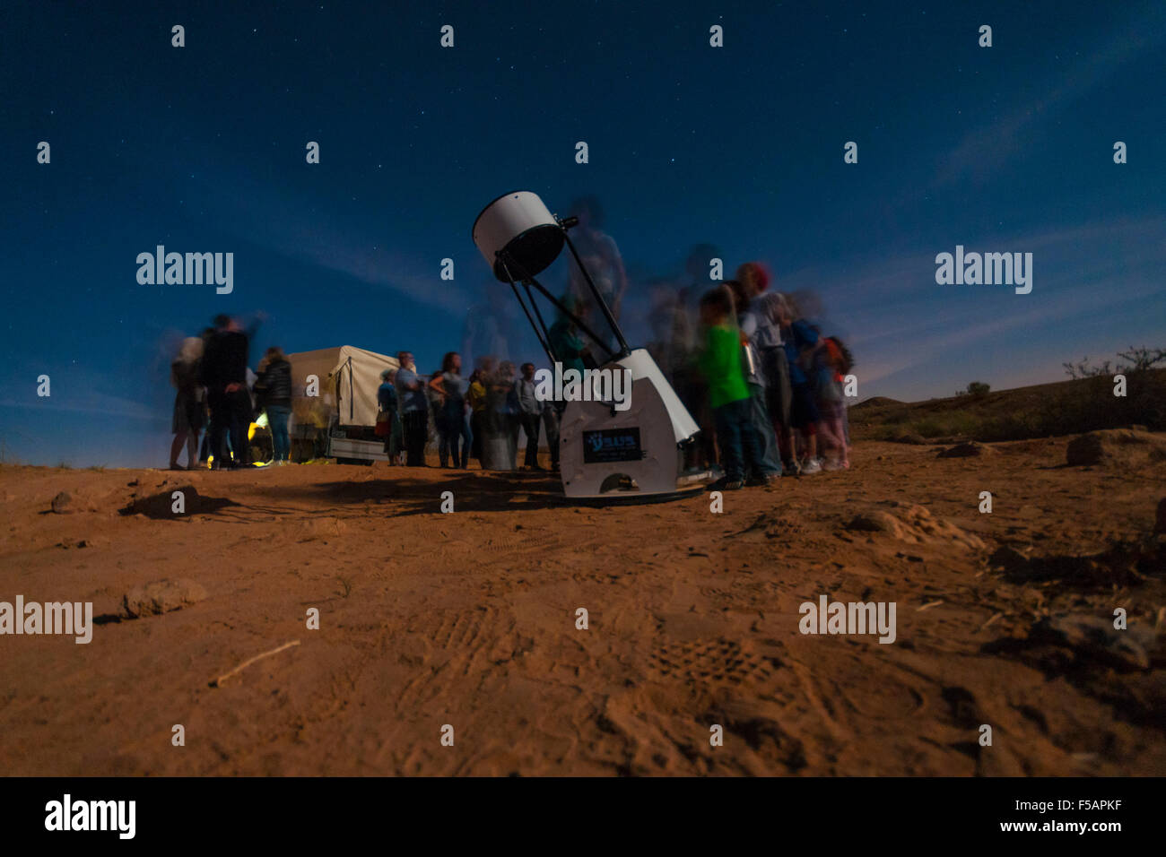 Ramon Crater, Israel. People line up to watch stars using a mirror ...