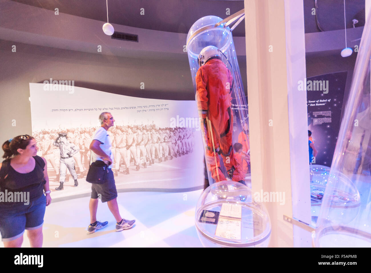 Mitzpe Ramon, Israel. Visitors at the Ilan Ramon Space exhibition look ...