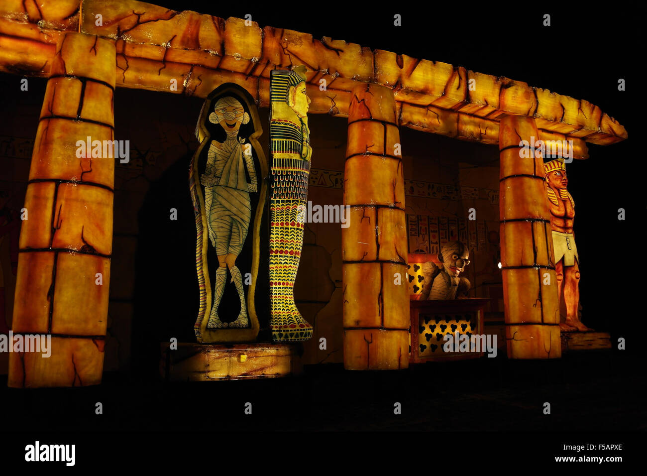 Night view open sarcophagues with mummified secret next to scary 'pop ...