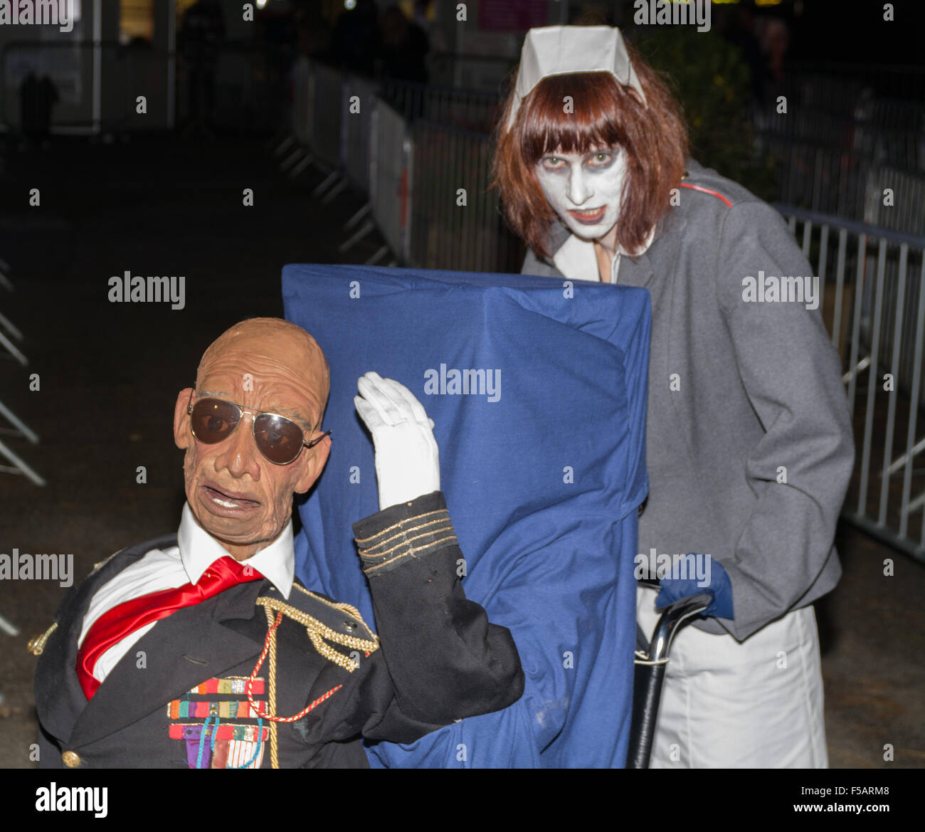 Halloween scary nurse and patient in wheelchair Stock Photo - Alamy