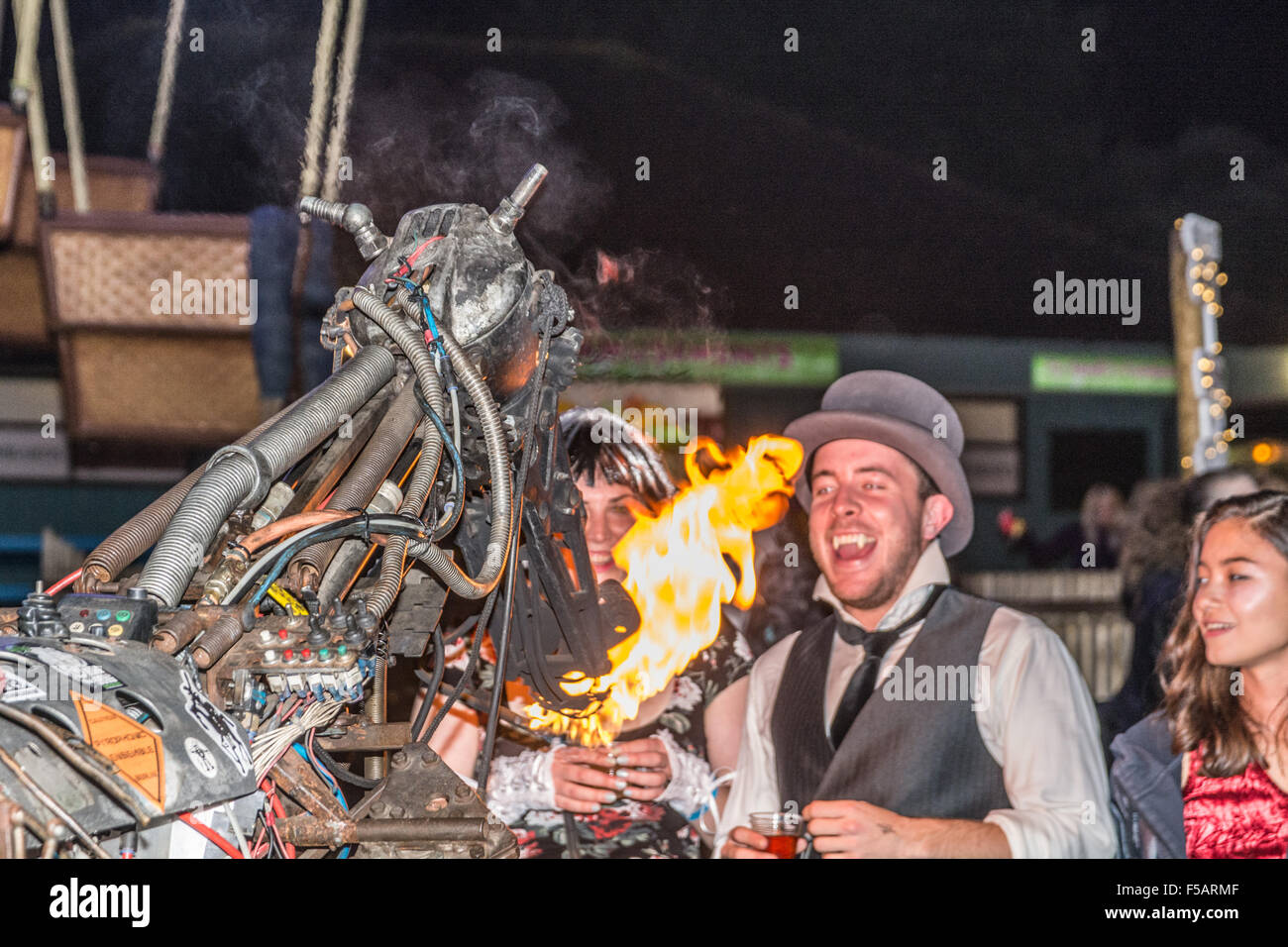 Fire breathing robotic horse blowing flames at party goers at the ...