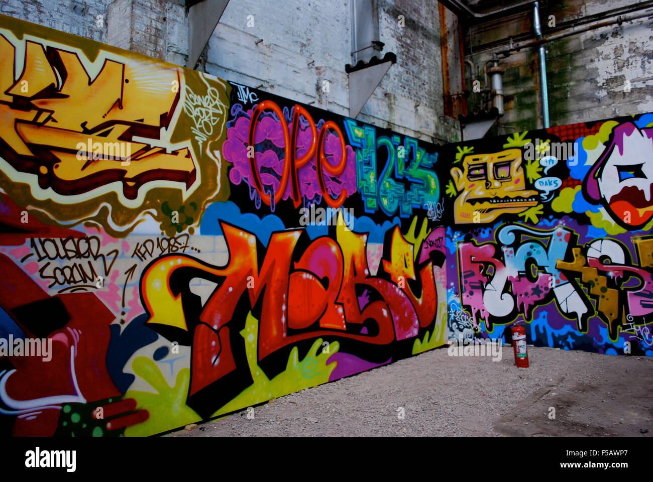 Graffiti inside industrial building Stock Photo - Alamy