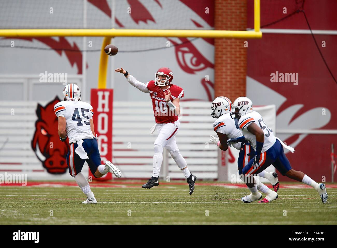 OCT 31, 2015: Arkansas QB Brandon Allen #10 makes a throw as he rolls ...
