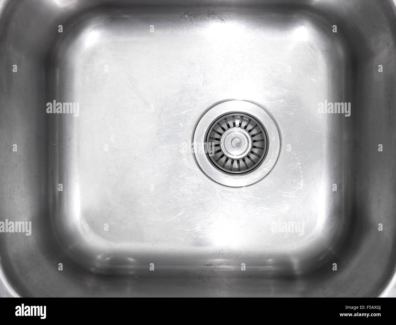 A close up photo of double kitchen sink Stock Photo - Alamy