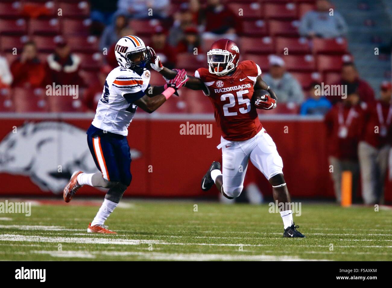 OCT 31, 2015: Arkansas running back Denzell Evans #25 stiff arms UT ...