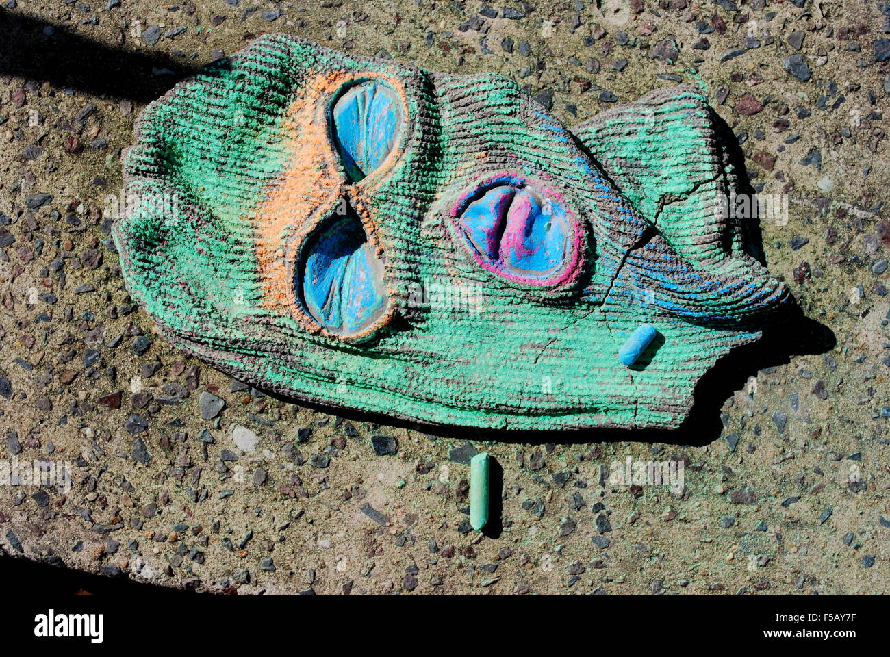 Concrete sculpture of face inside a balaclava colored with chalk Stock ...