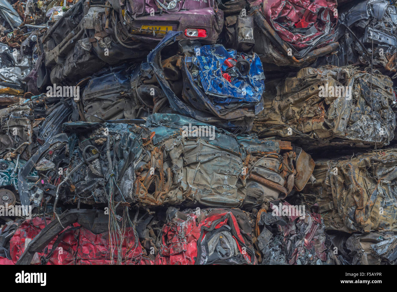 Piled mass of crushed , compacted, cars / automobiles Stock Photo - Alamy