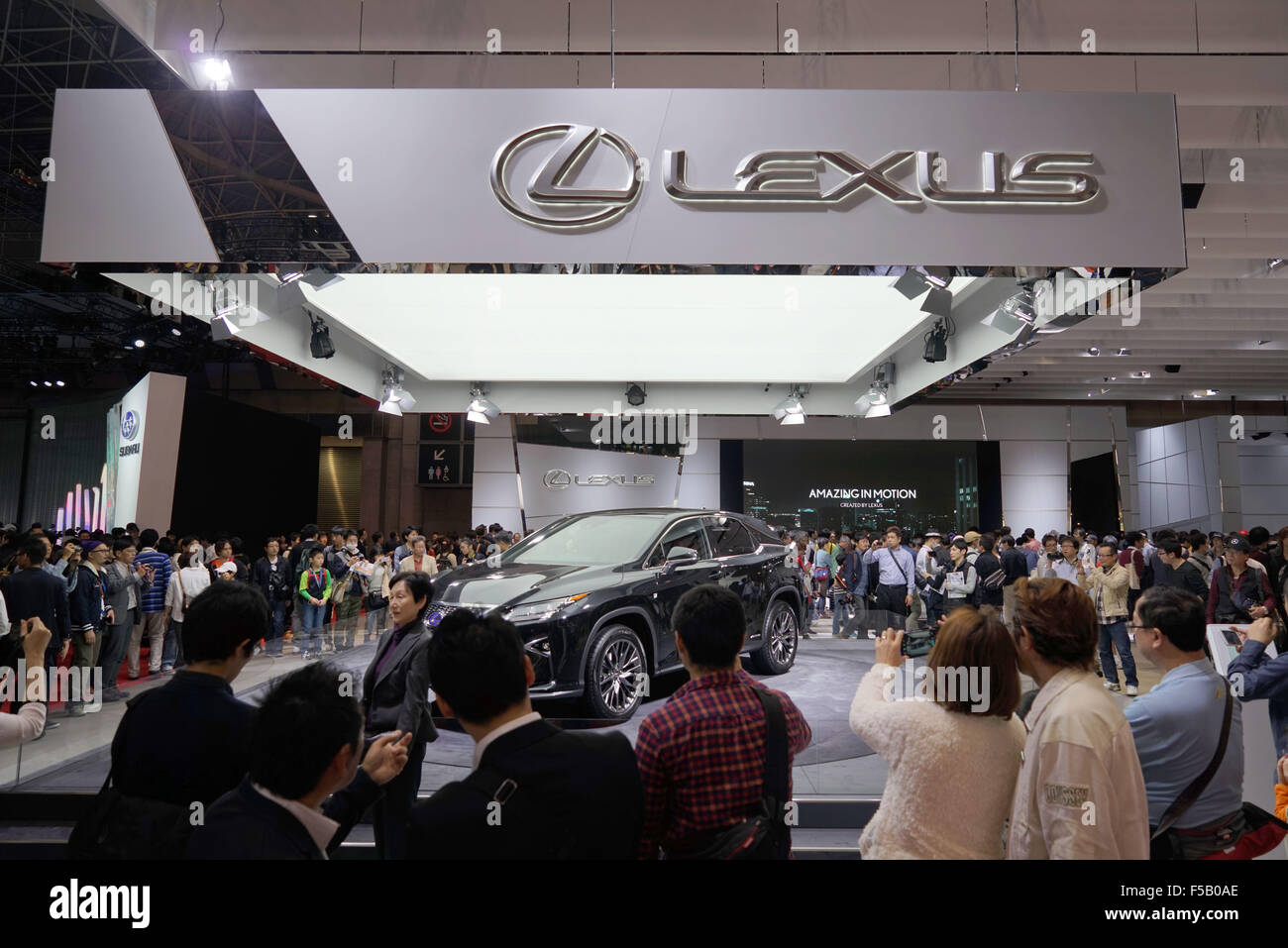 Tokyo, Japan. 31st Oct, 2015. A throng of visitors mill around Lexus ...