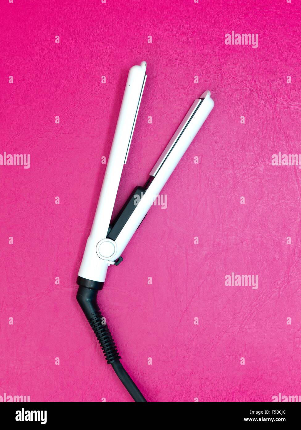 A studio photo of a hair straightener Stock Photo - Alamy