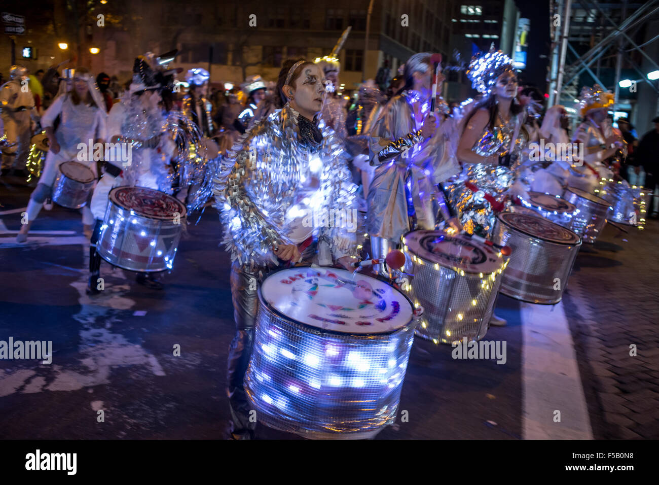 New York, NY - 31 October 2015. A drum line made up of energetic women ...