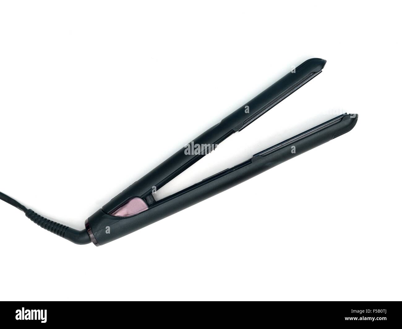 A studio photo of a hair straightener Stock Photo - Alamy