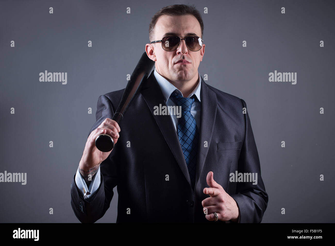 male gangster with baseball bat Stock Photo - Alamy