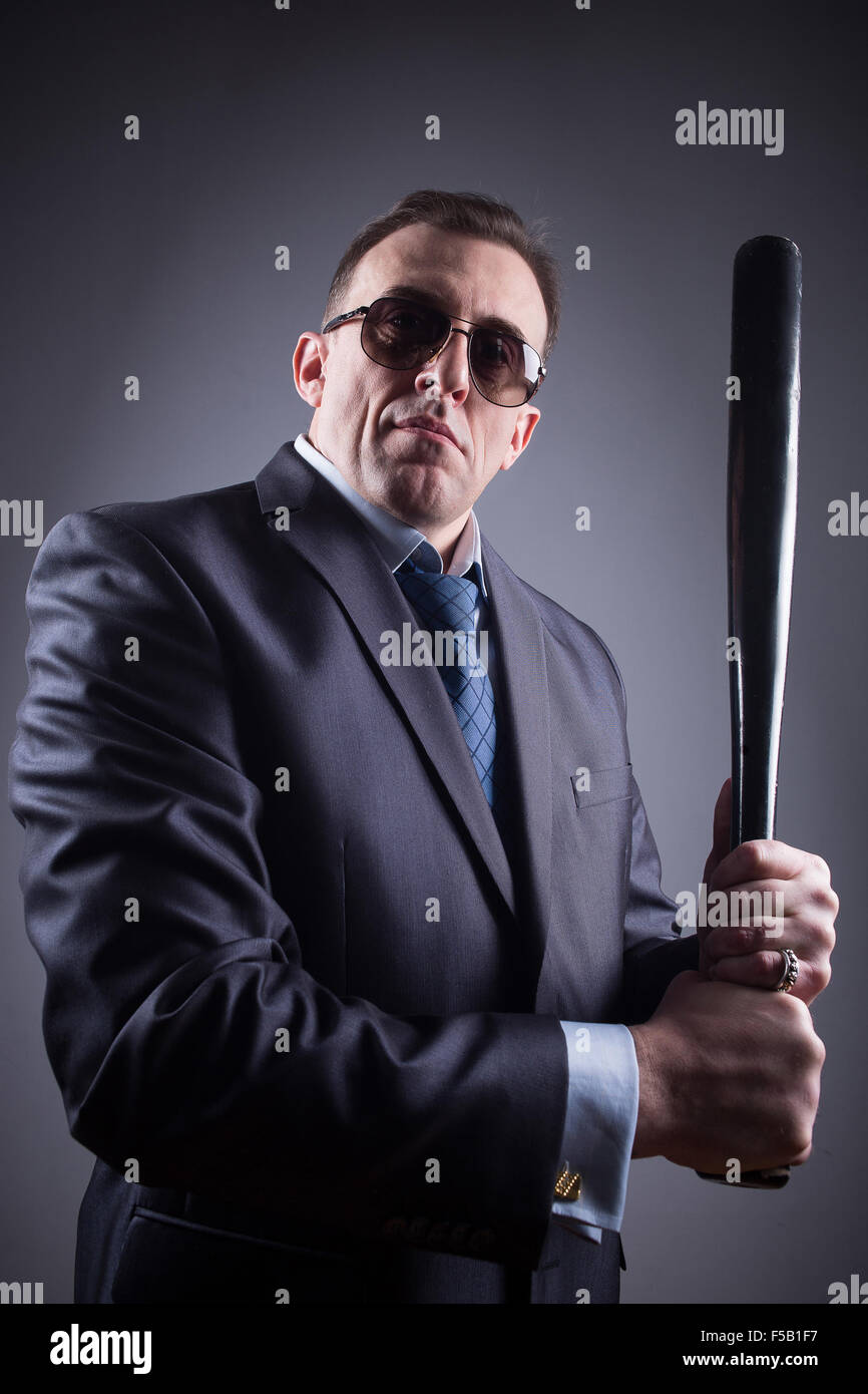 male gangster with baseball bat Stock Photo - Alamy
